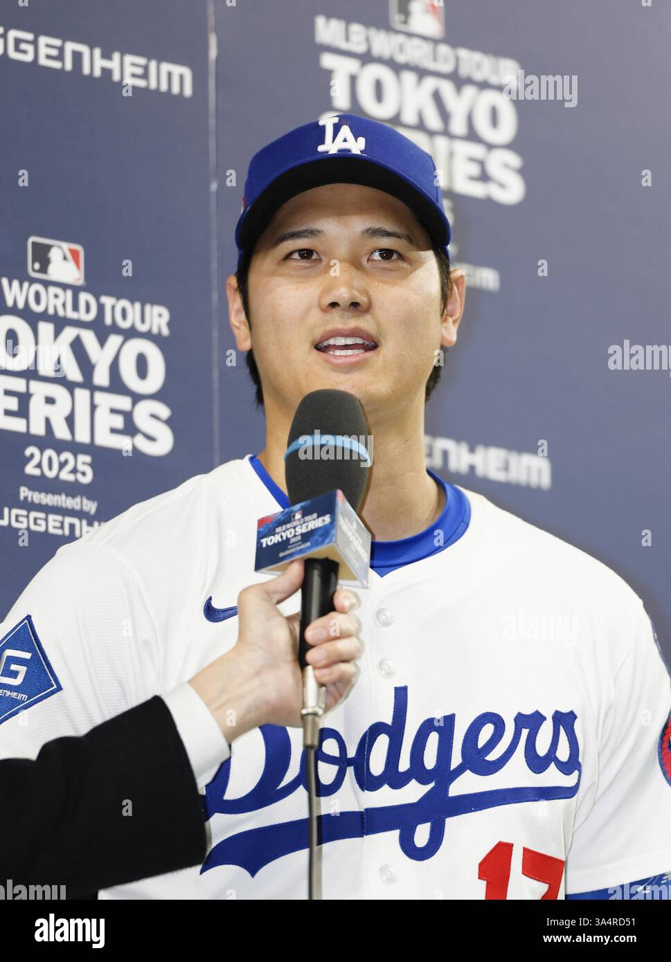 Los Angeles Dodgers designated hitter Shohei Ohtani gives an interview ...
