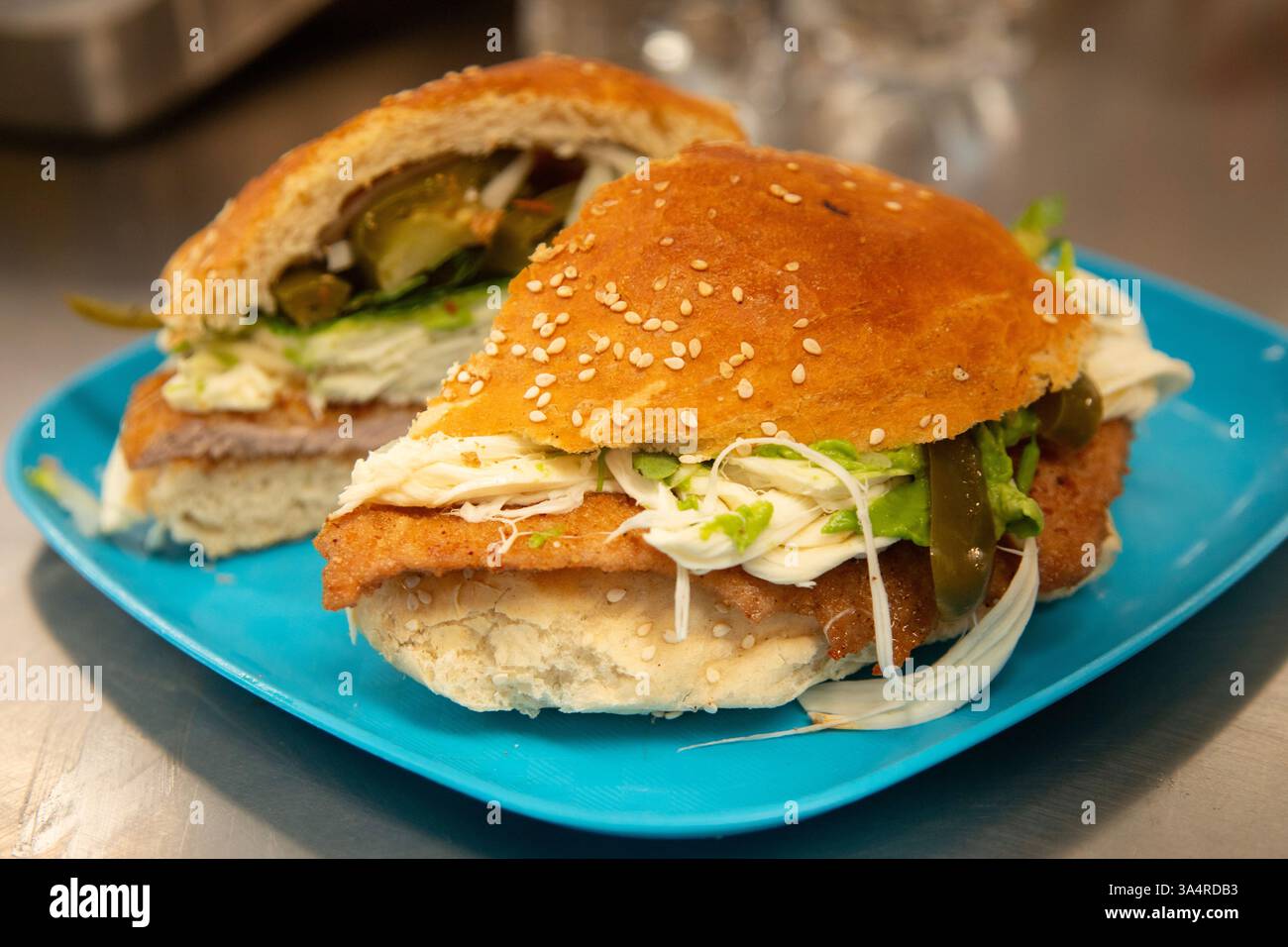 Cemita Poblana. A traditional Mexican sandwich with breaded pork and ...