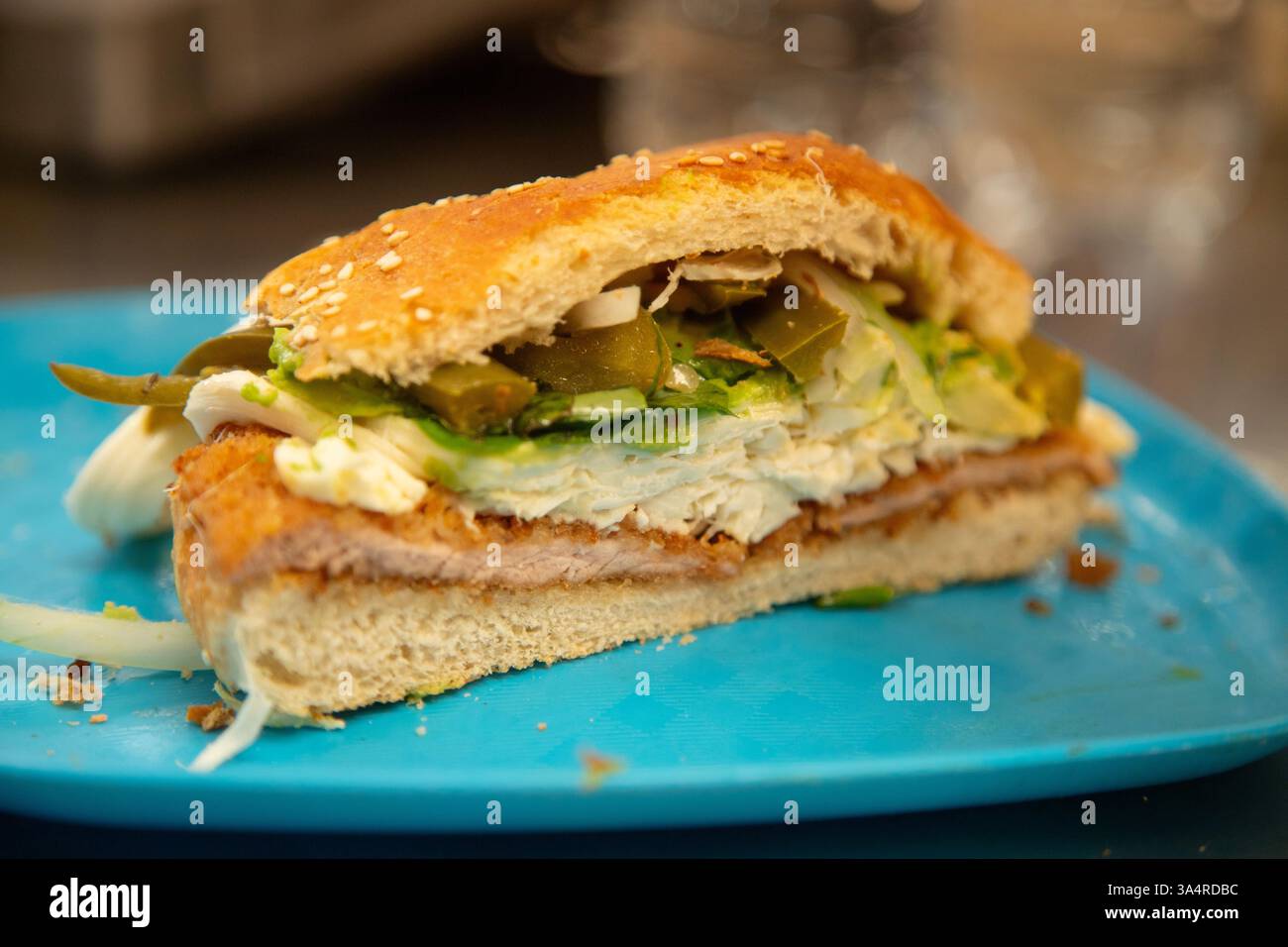 Cemita Poblana. A traditional Mexican sandwich with breaded pork and ...
