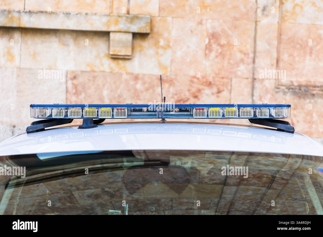 A detailed close-up of the emergency light bar mounted on the roof of a ...
