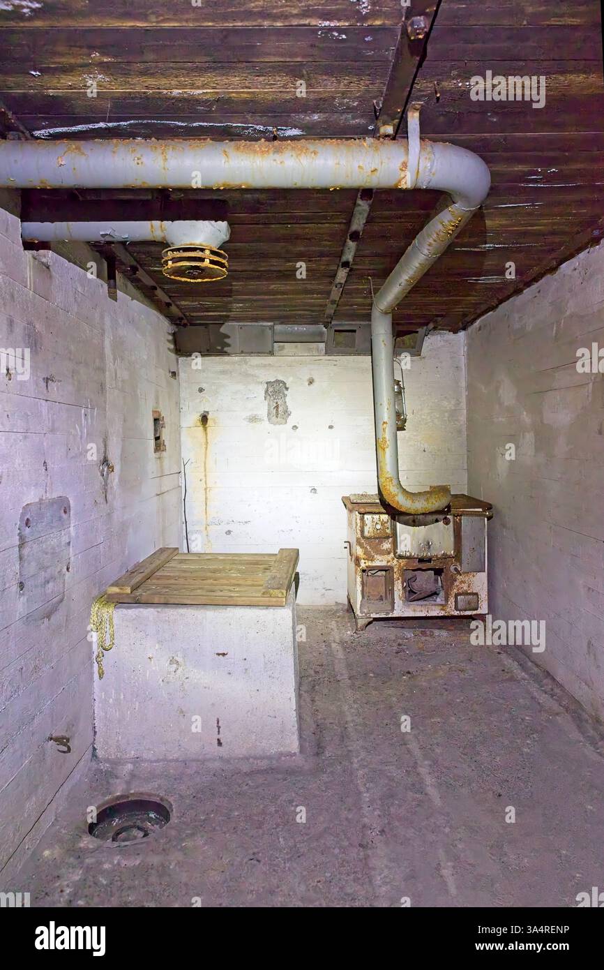 Finnish bunker B132 interior view with old stove at Salpa Line ...