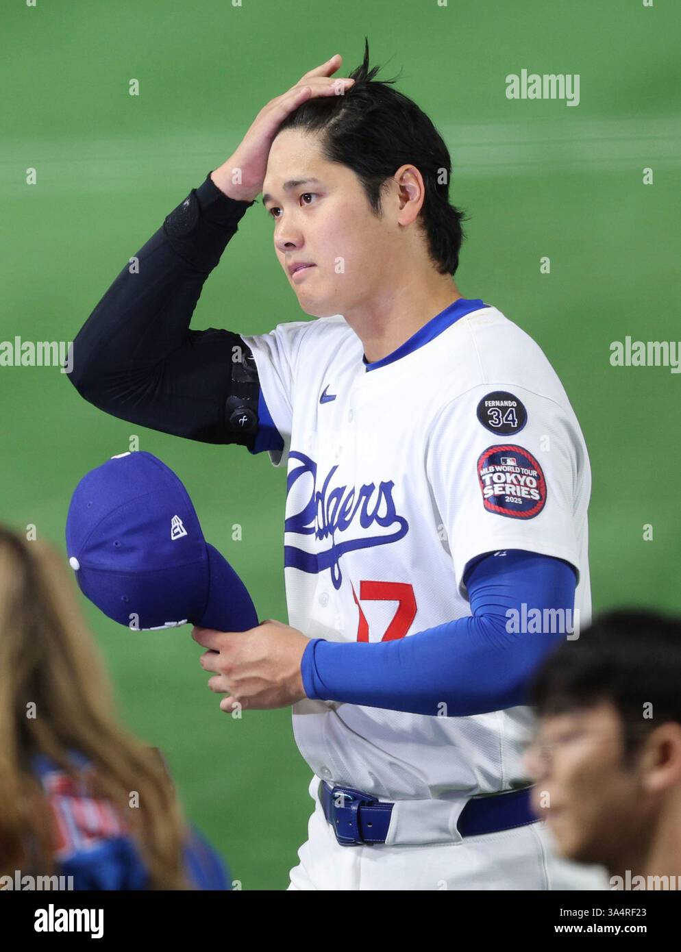 Shohei Otani walks after the MLB Tokyo Series game between the Chicago ...