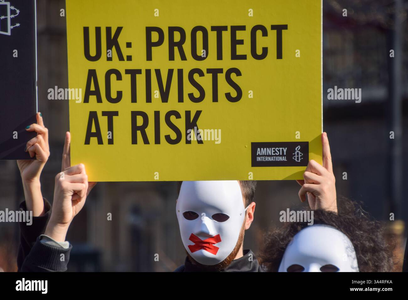 London, UK. 19th March 2025. Campaigners from Amnesty International UK ...