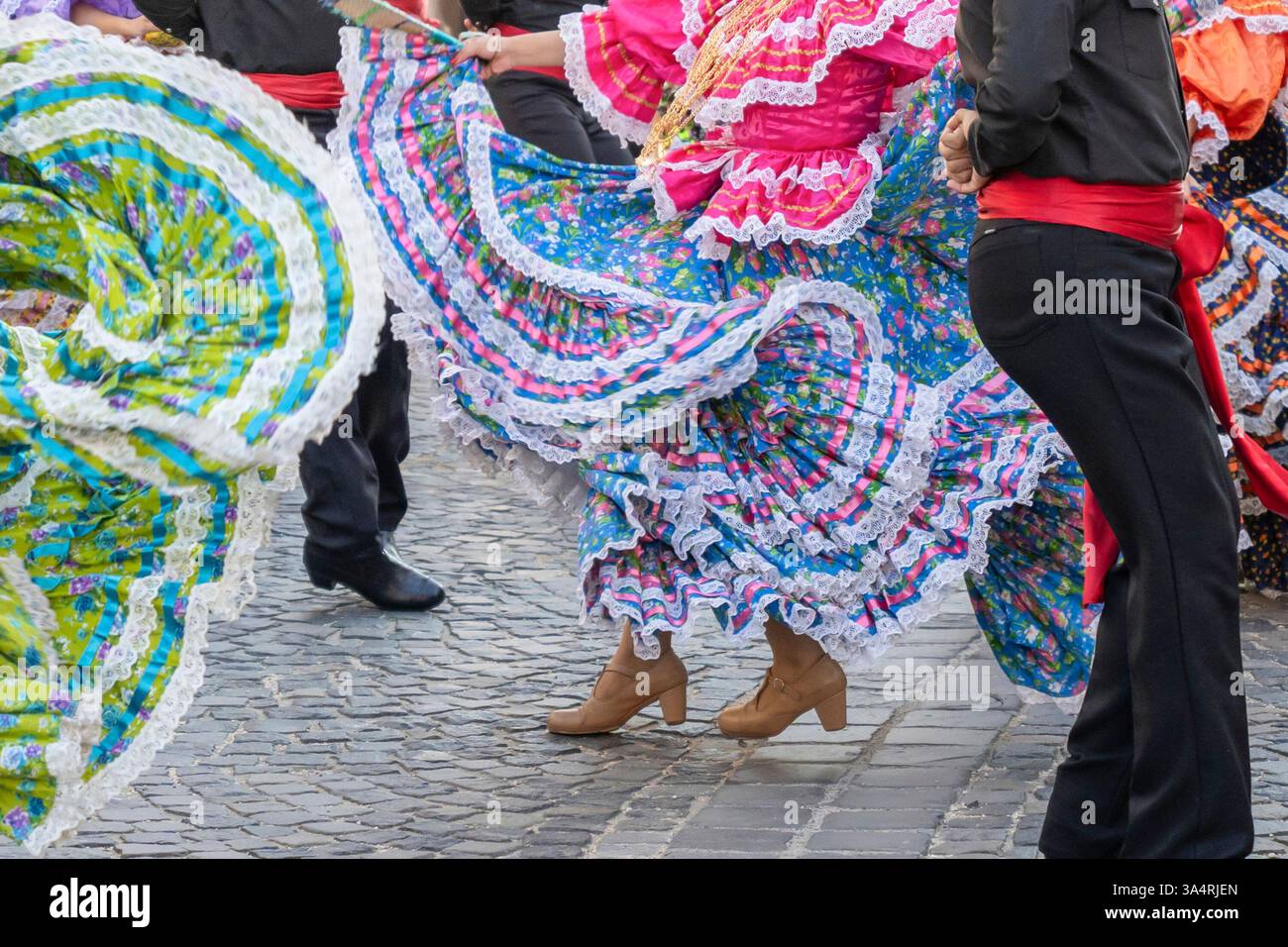 Colorful clothes of traditional Mexican folklore dancers in motion ...