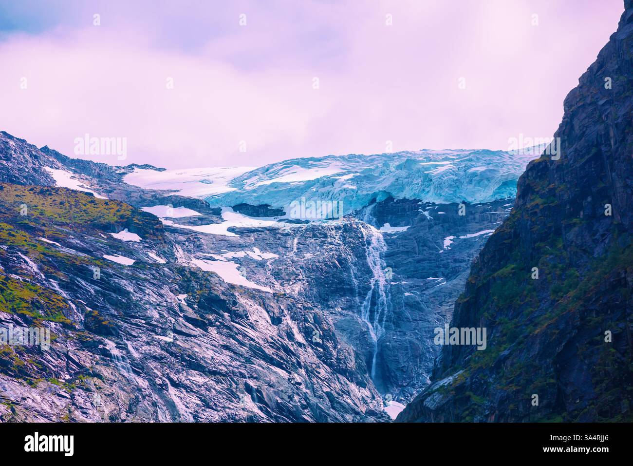 Briksdal glacier hike. Briksdalsbreen Mountain during sunrise. Norway ...