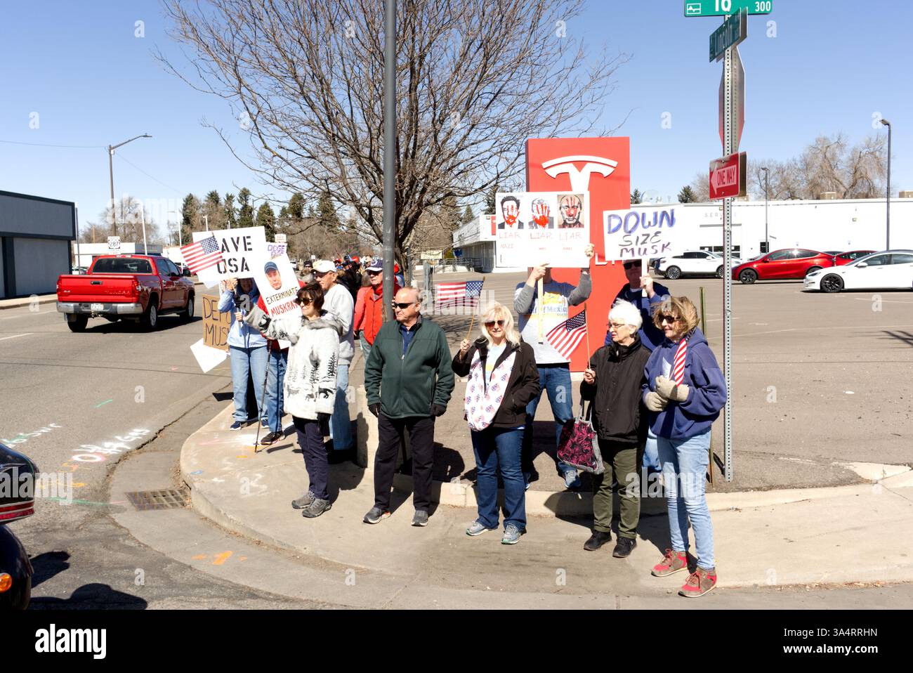 Protest agains Elon Musk at a Tesla dealership March 2025 Stock Photo ...