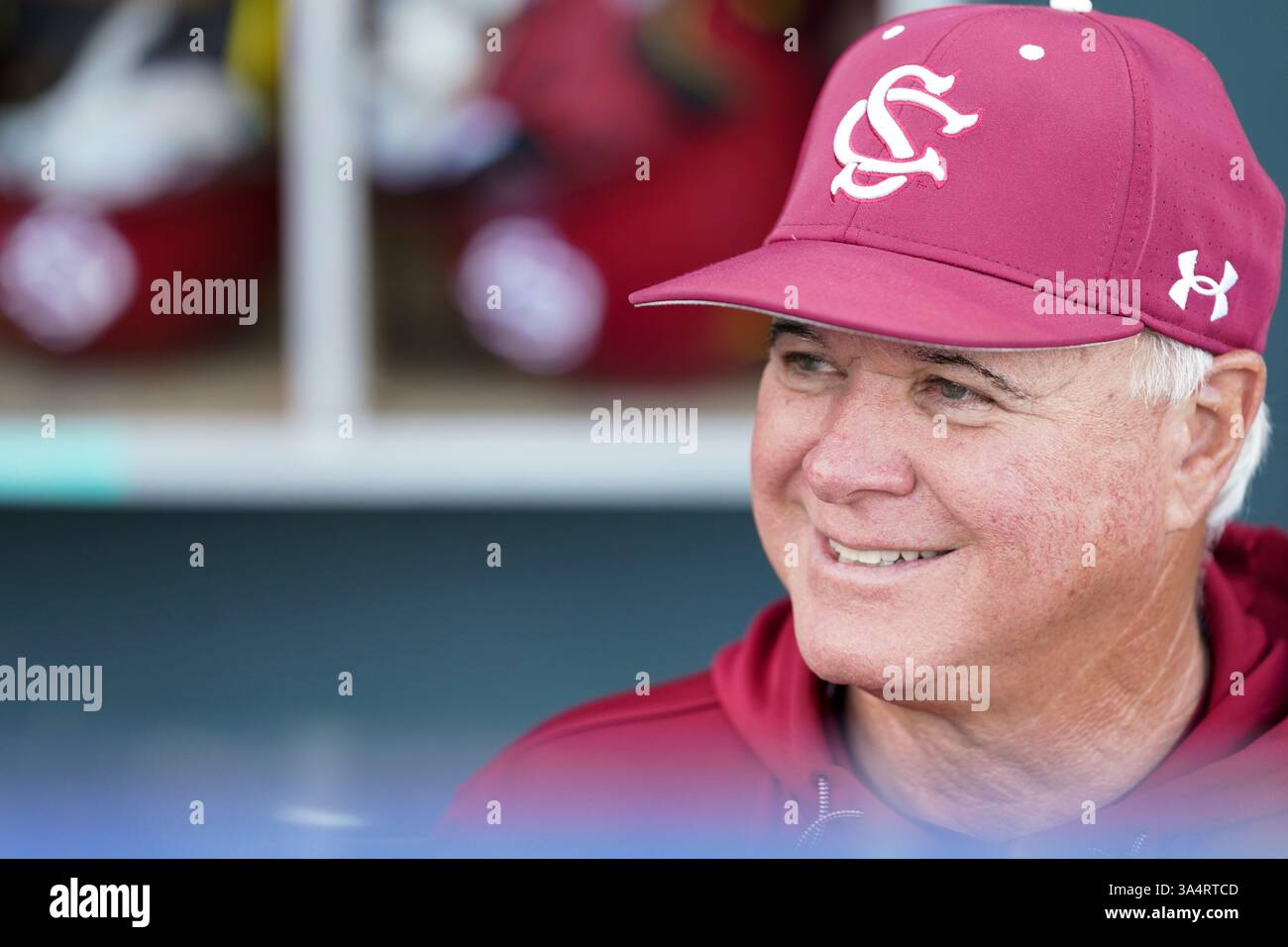 South Carolina head coach Paul Mainieri smiles in the dugout before an ...
