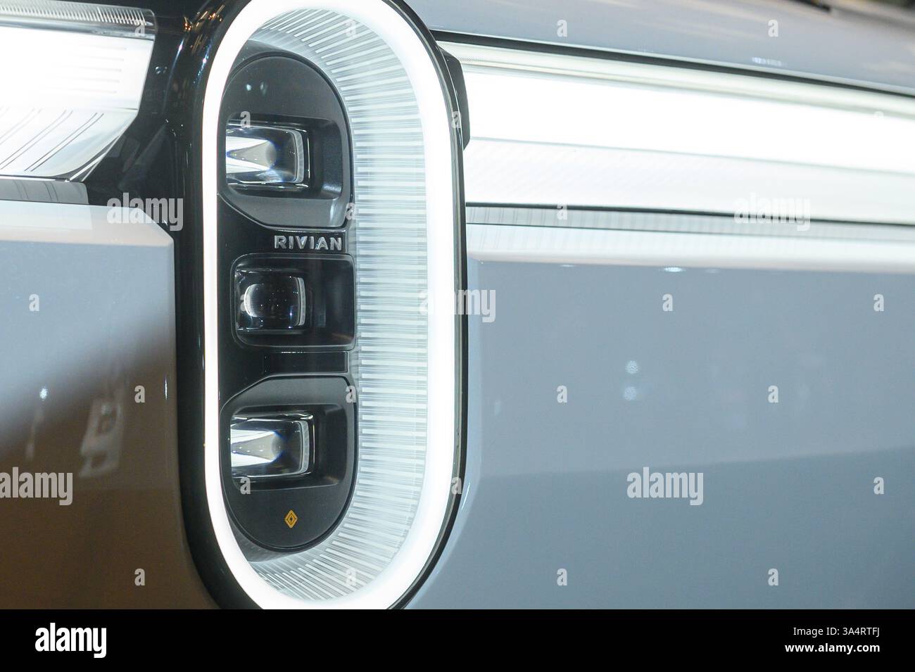 Toronto, ON, Canada - March 15, 2025: A Rivian emblem is displayed on ...