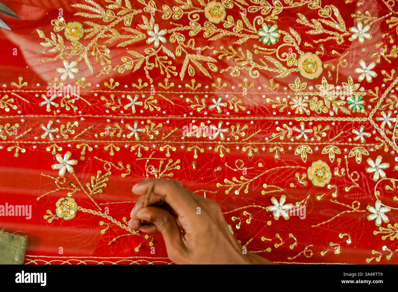 A Zardozi and Karchupi artisan of Bihari community, in Chittagong city ...