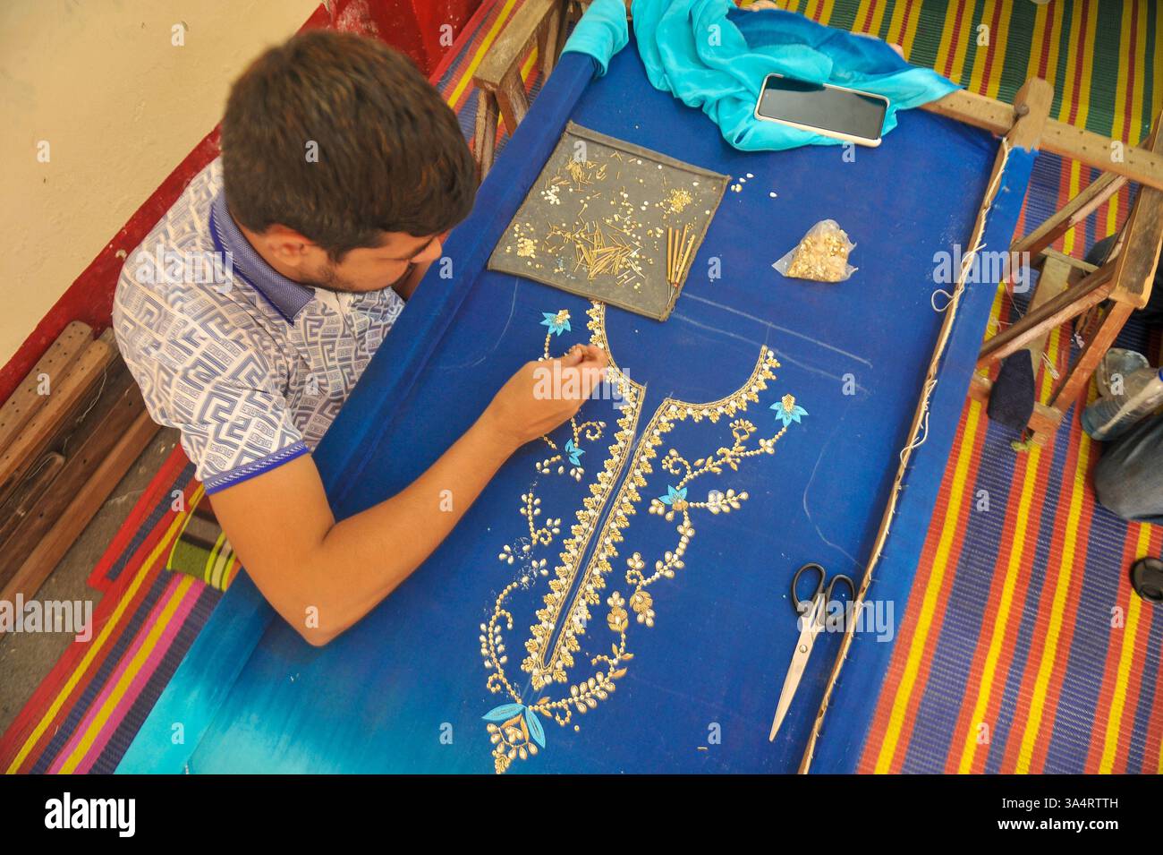 A Zardozi and Karchupi artisan of Bihari community, in Chittagong city ...