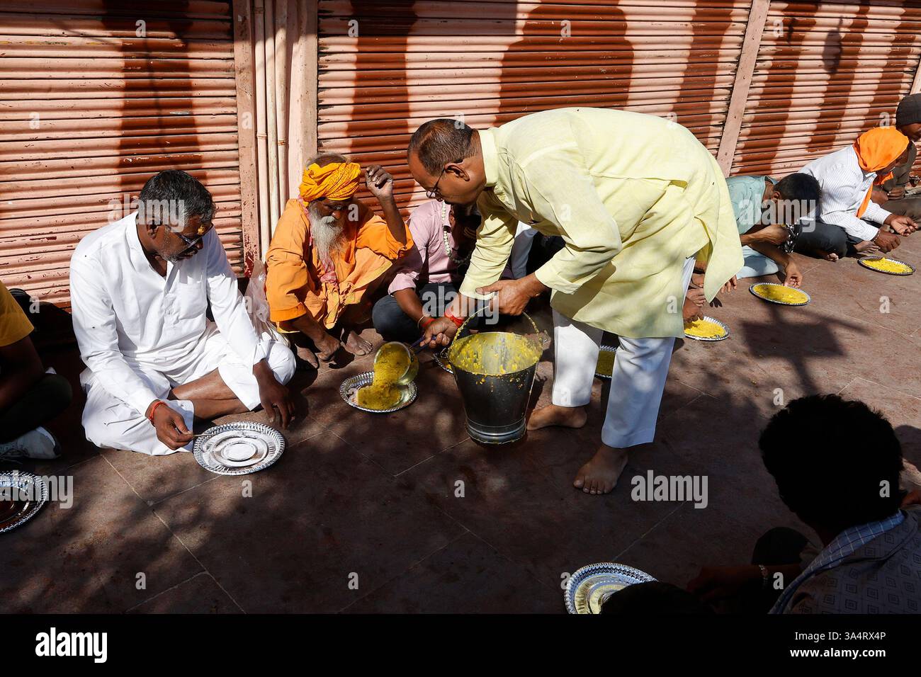 Food is distributed to the poor & homeless in Varanasi, Uttar Pradesh ...