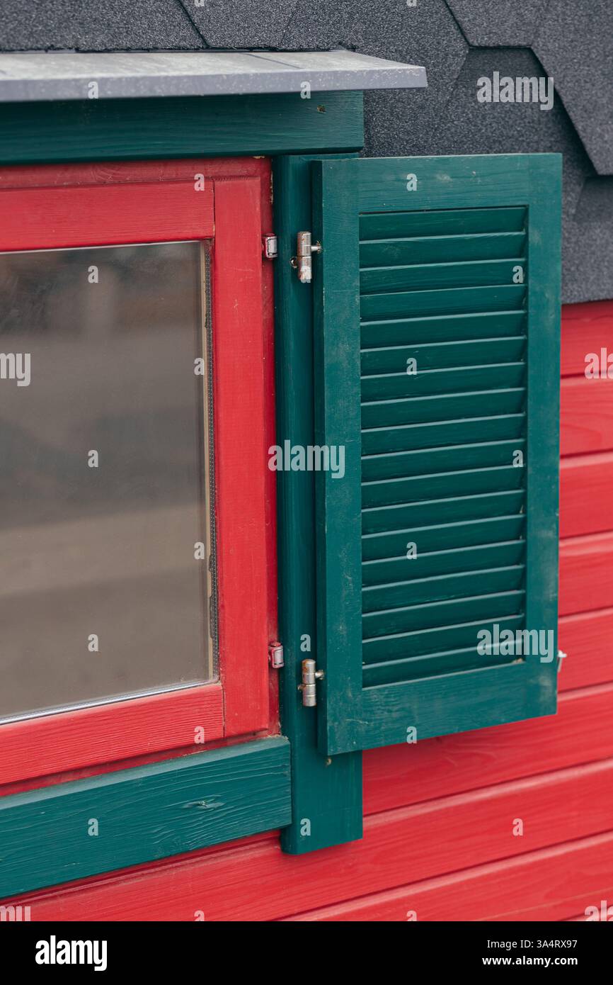 Opened windows shutters, wooden exterior design Stock Photo - Alamy