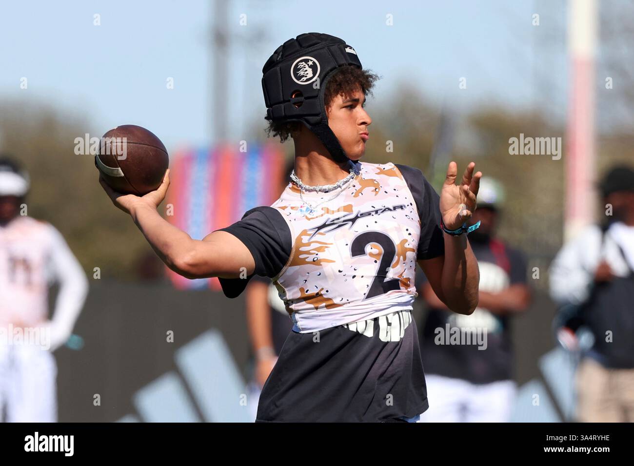 Hellstar quarterback Dia Bell (2) throws a pass against Cold Hearts in ...