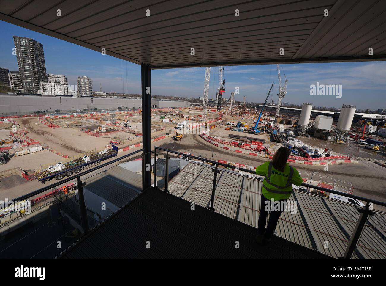 A visitor takes in a view of Balfour Beatty Vinci Systra construction ...