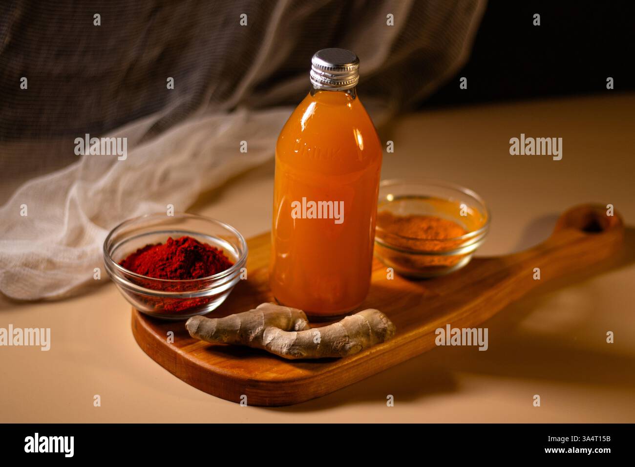 Immunity drink with turmeric powder in bottle. Homemade turmeric tea ...