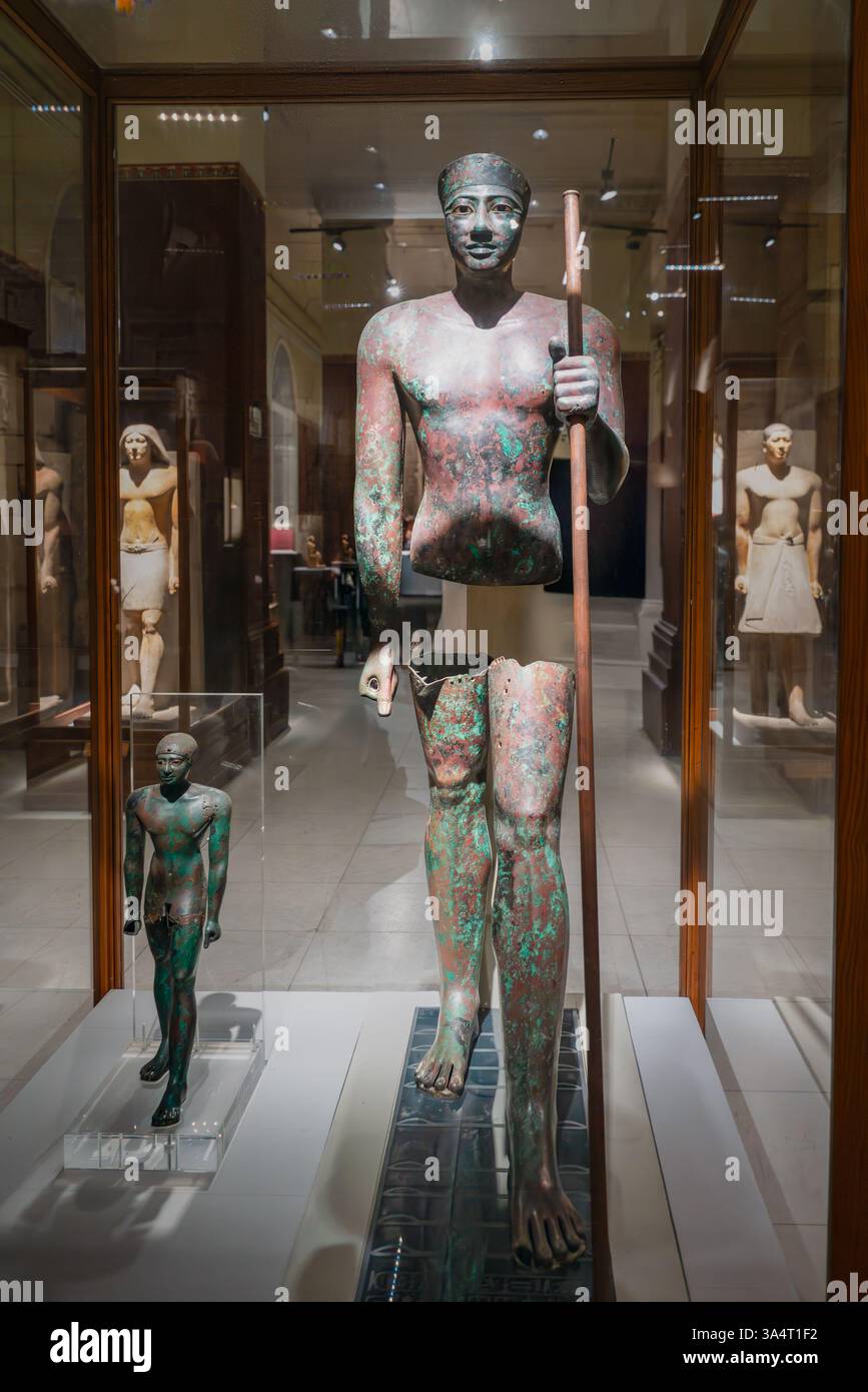 gyptian Museum, Cairo, Egypt - January 13, 2025: Two copper statues of ...