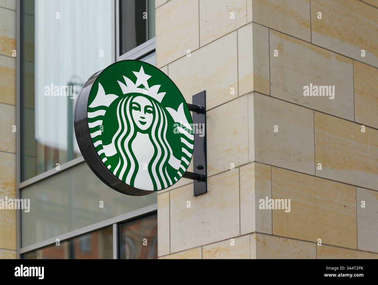 Neon sign for the global coffee house chain Starbucks in the city ...