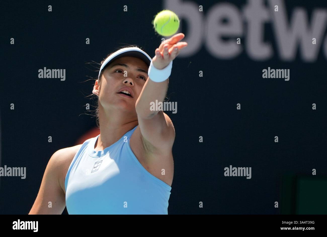 Emma Raducanu, of Great Britain, serves to Sayaka Ishii, of Japan, during the Miami Open tennis ...