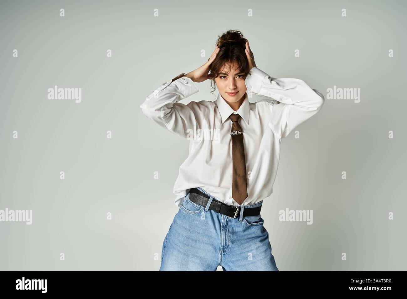 Charming individual shows playful style with a relaxed pose and stylish ...