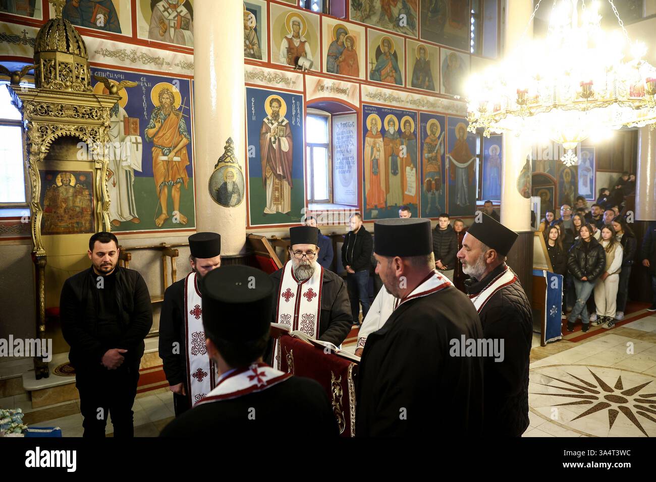 Orthodox priests read prayers in Kocani, North Macedonia, Wednesday ...