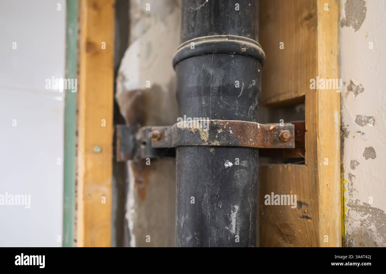 Old sewer stack in an apartment building Stock Photo - Alamy