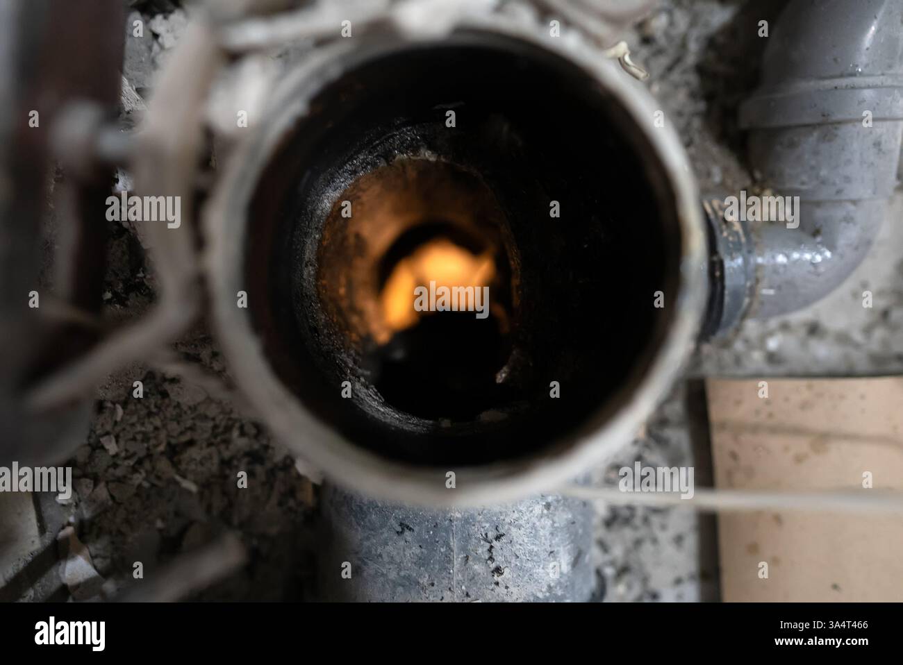 Disassembled sewer stack awaiting replacement with a new pipe Stock ...