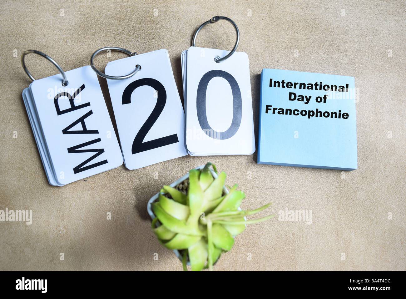 March 20. International Day of Francophonie with Calendar on table ...