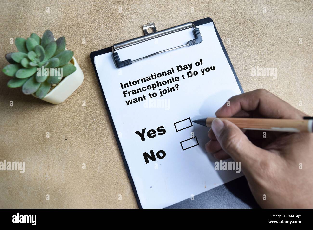 Do you want to Join? Yes or No International Day of Francophonie write on paperwork isolated on ...