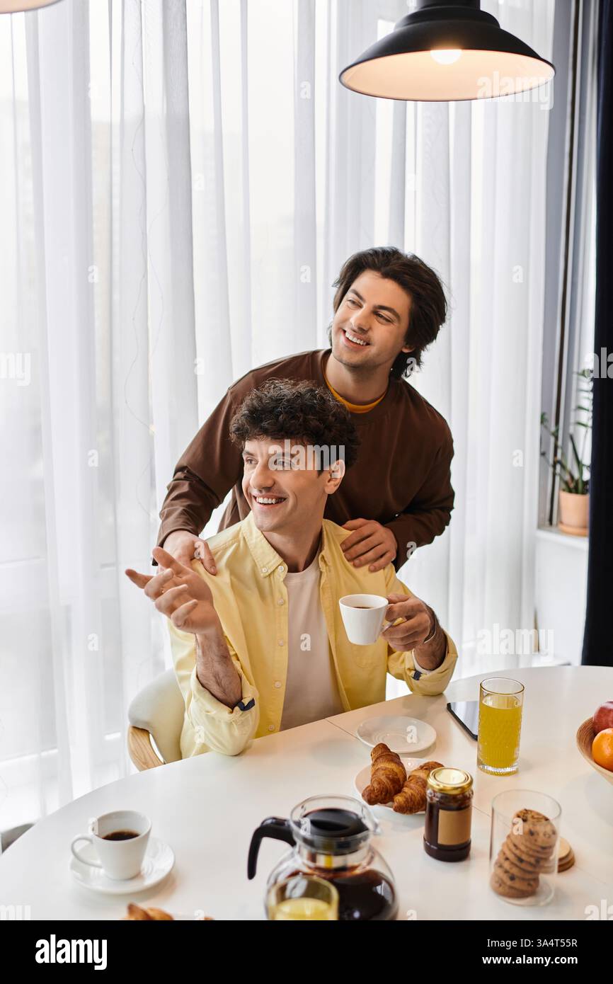 gay couple shares a warm moment in their stylish apartment, enjoying ...