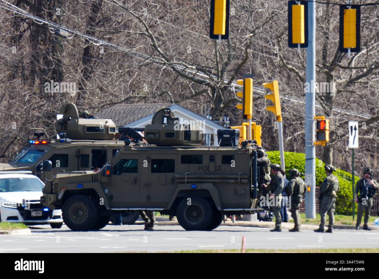 Langley, Virginia, USA. 19th Mar, 2025. A man with a gun at the ...