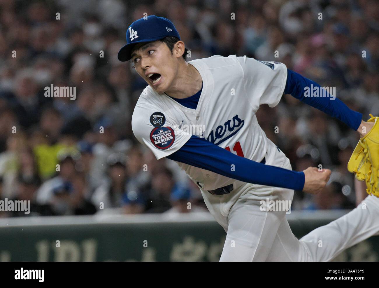 Tokyo, Japan. 19th Mar, 2025. Los Angeles Dodgers Roki Sasaki throws a ...