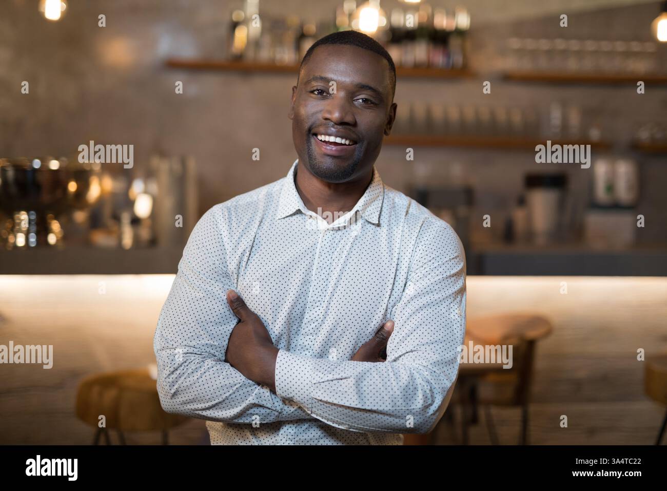 Restaurant waiter standing confidently in hi-res stock photography and ...