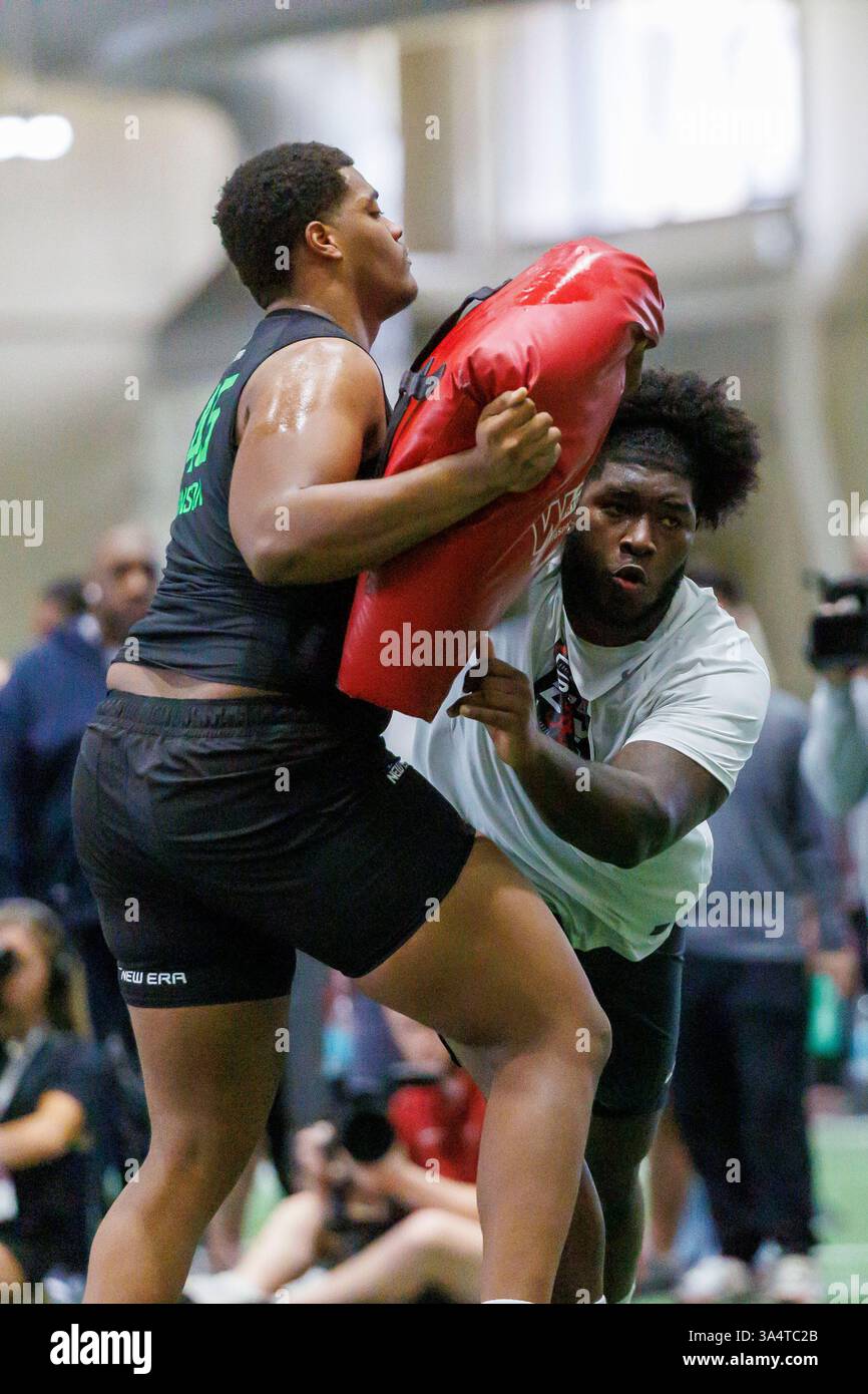 Former Alabama offensive lineman Tyler Booker, right, works against ...