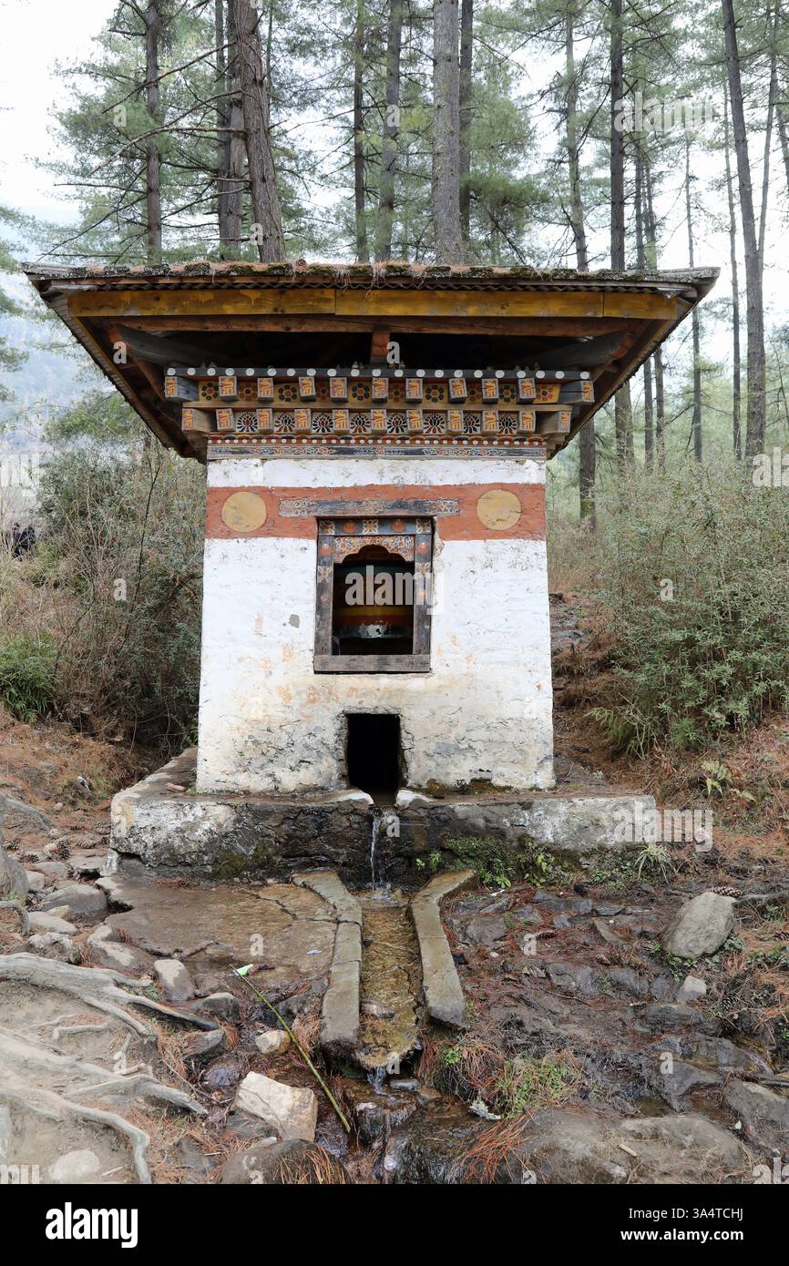Water powered prayer wheel at a shrine on the trail to Tigers Nest ...