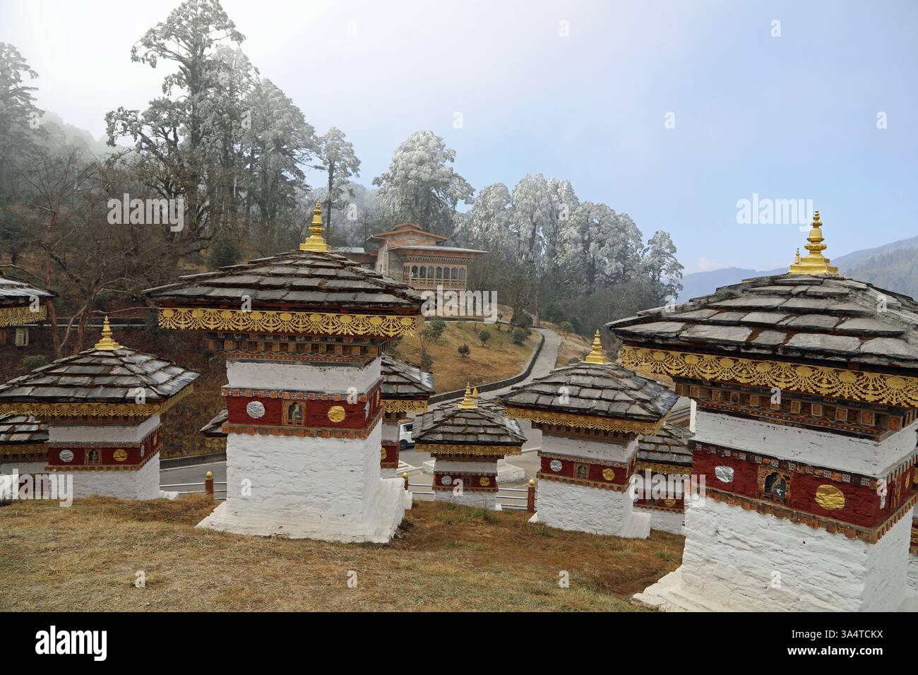 Memorial chortens at Dochula Pass in the Kingdom of Bhutan Stock Photo ...