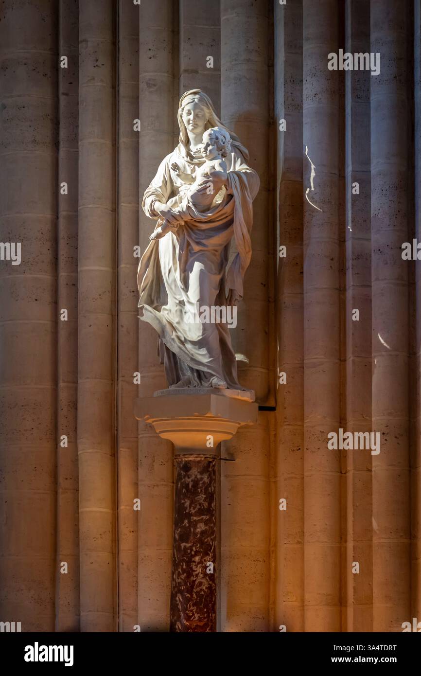 Paris, France - 03 18 2025: Notre Dame de Paris. View the statue of the ...
