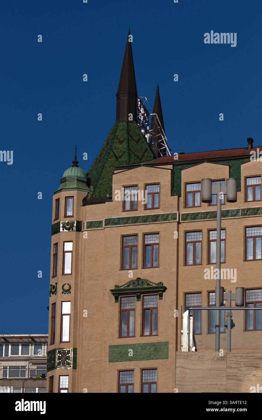 The striking design of a historic building features intricate green ...