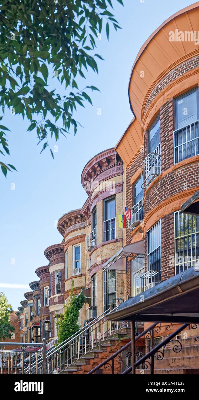 A row of brick-and-terra-cotta two-family homes on 58th Street in ...