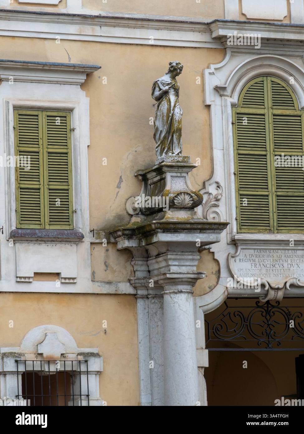 Colorno, Italy March 1st 2025 Ancient statue atop a column adorning the ...