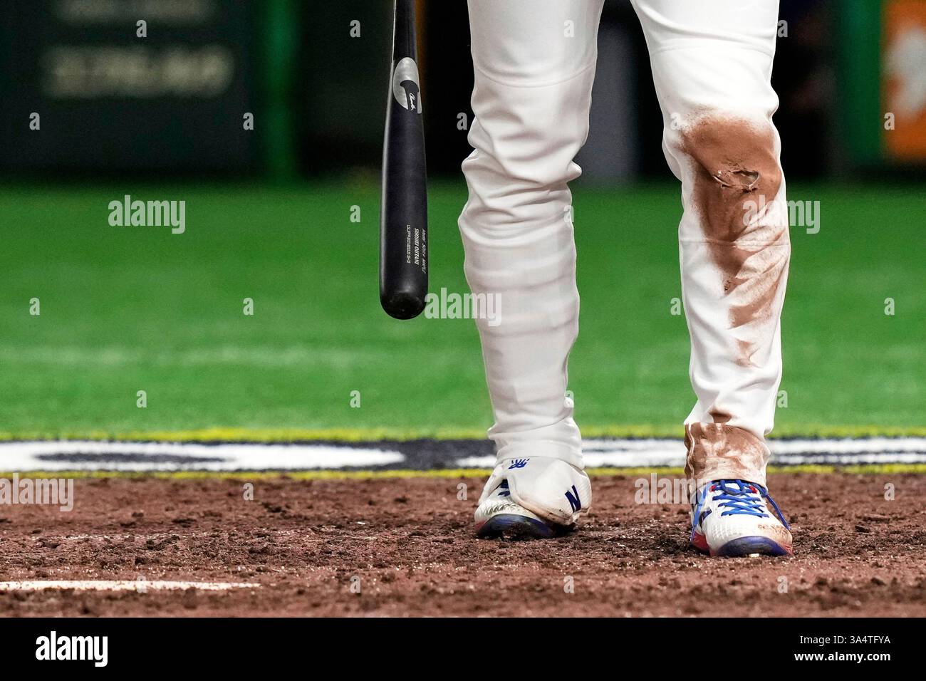 Los Angeles Dodgers' Shohei Ohtani stands by the plate during an at-bat ...
