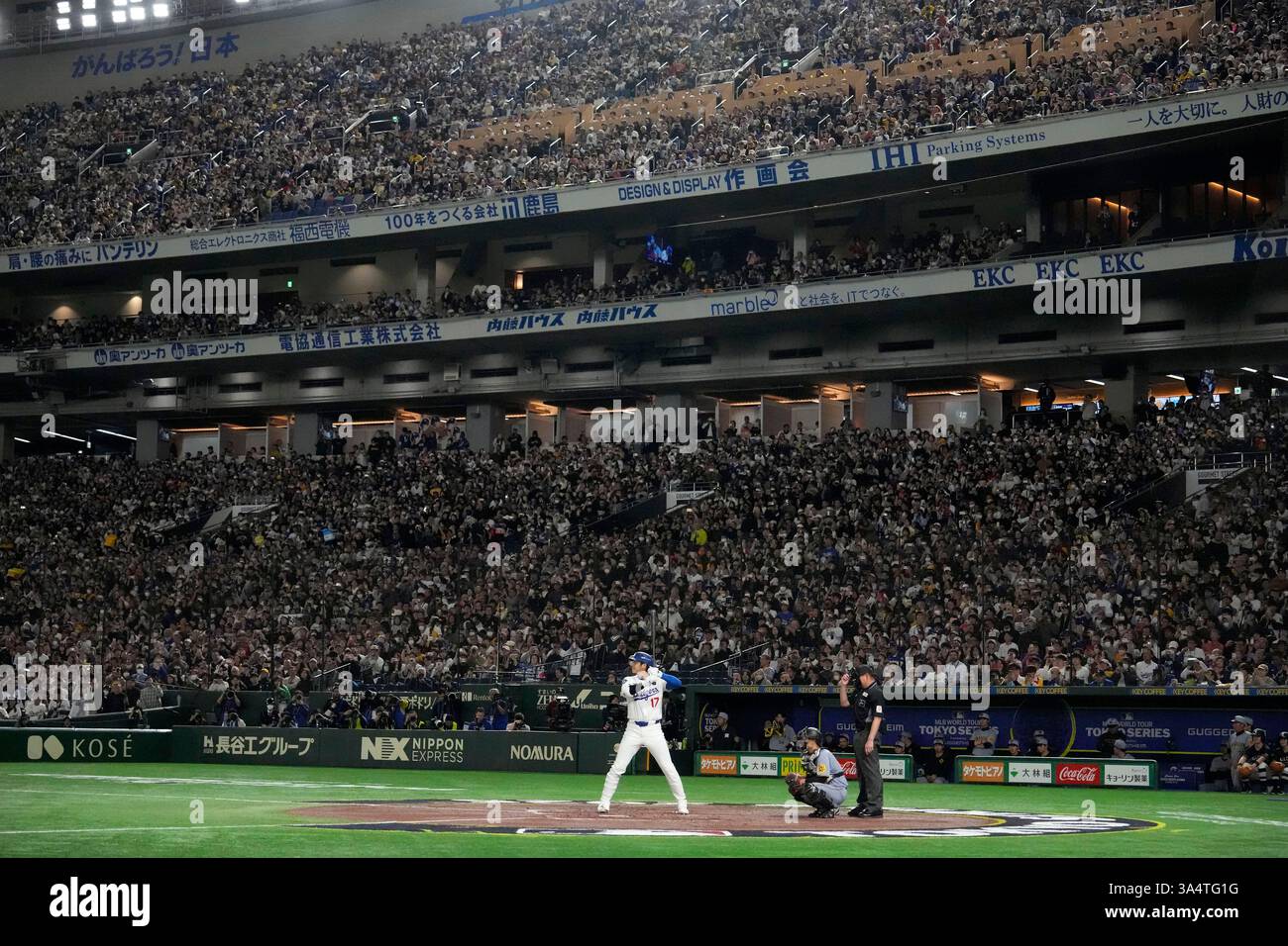 Los Angeles Dodgers' Shohei Ohtani, bottom center, bats against the ...