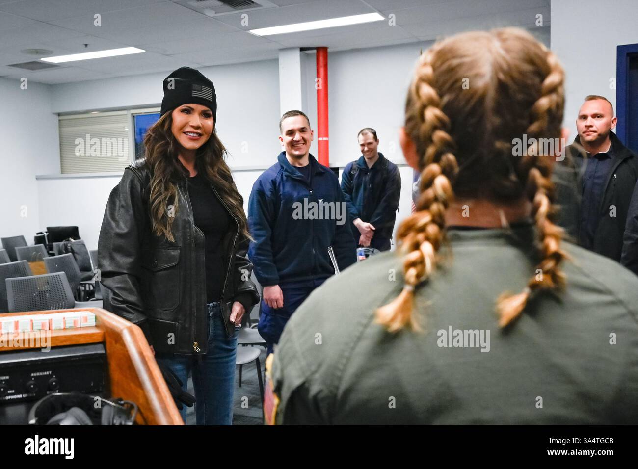 Department of Homeland Security (DHS) Secretary Kristi Noem visits with ...