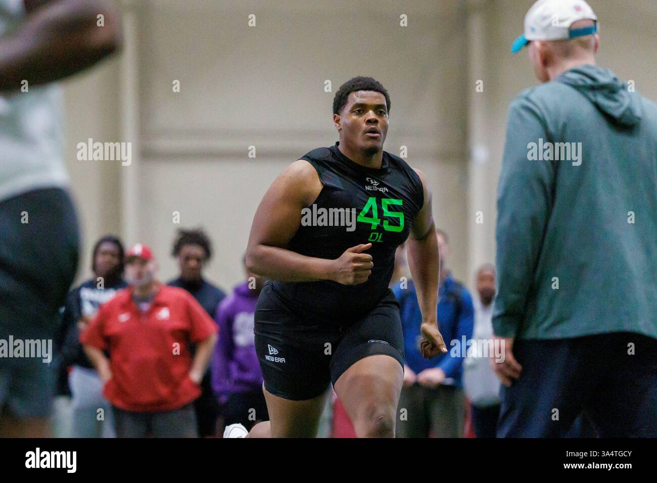 Former Alabama A&M offensive lineman Carson Vinson works out during ...
