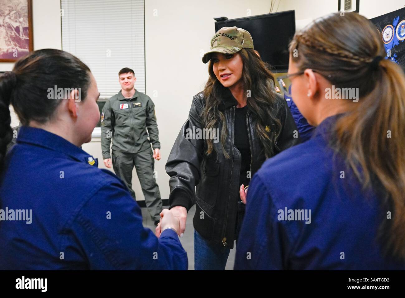 Department of Homeland Security (DHS) Secretary Kristi Noem visits with ...