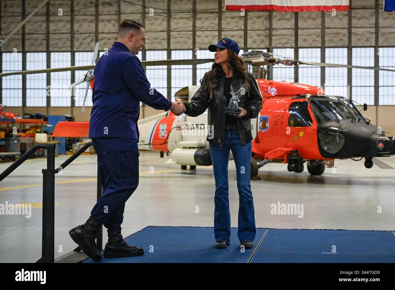 Department of Homeland Security (DHS) Secretary Kristi Noem visits with ...