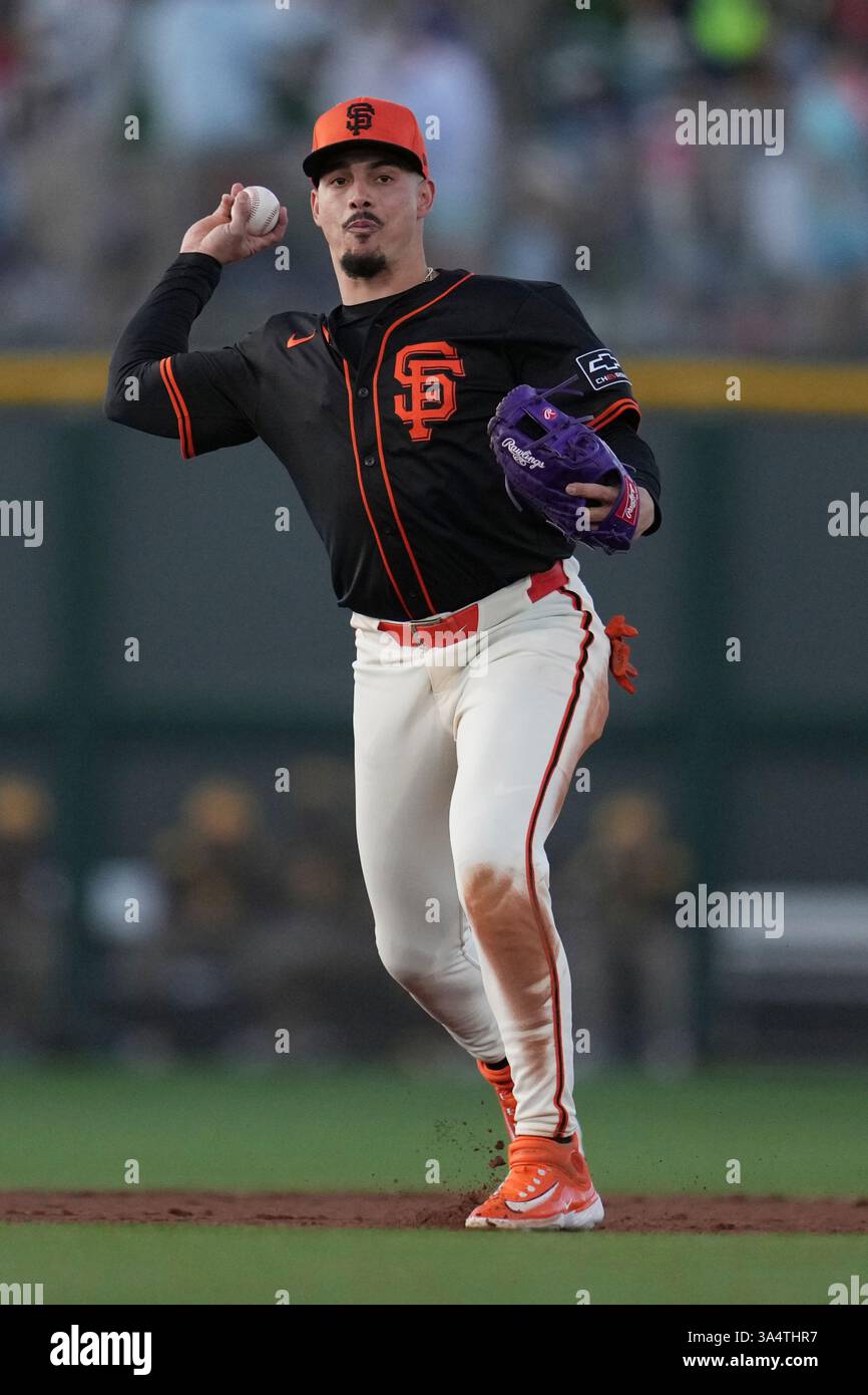 San Francisco Giants shortstop Willy Adames throws to first base to get ...