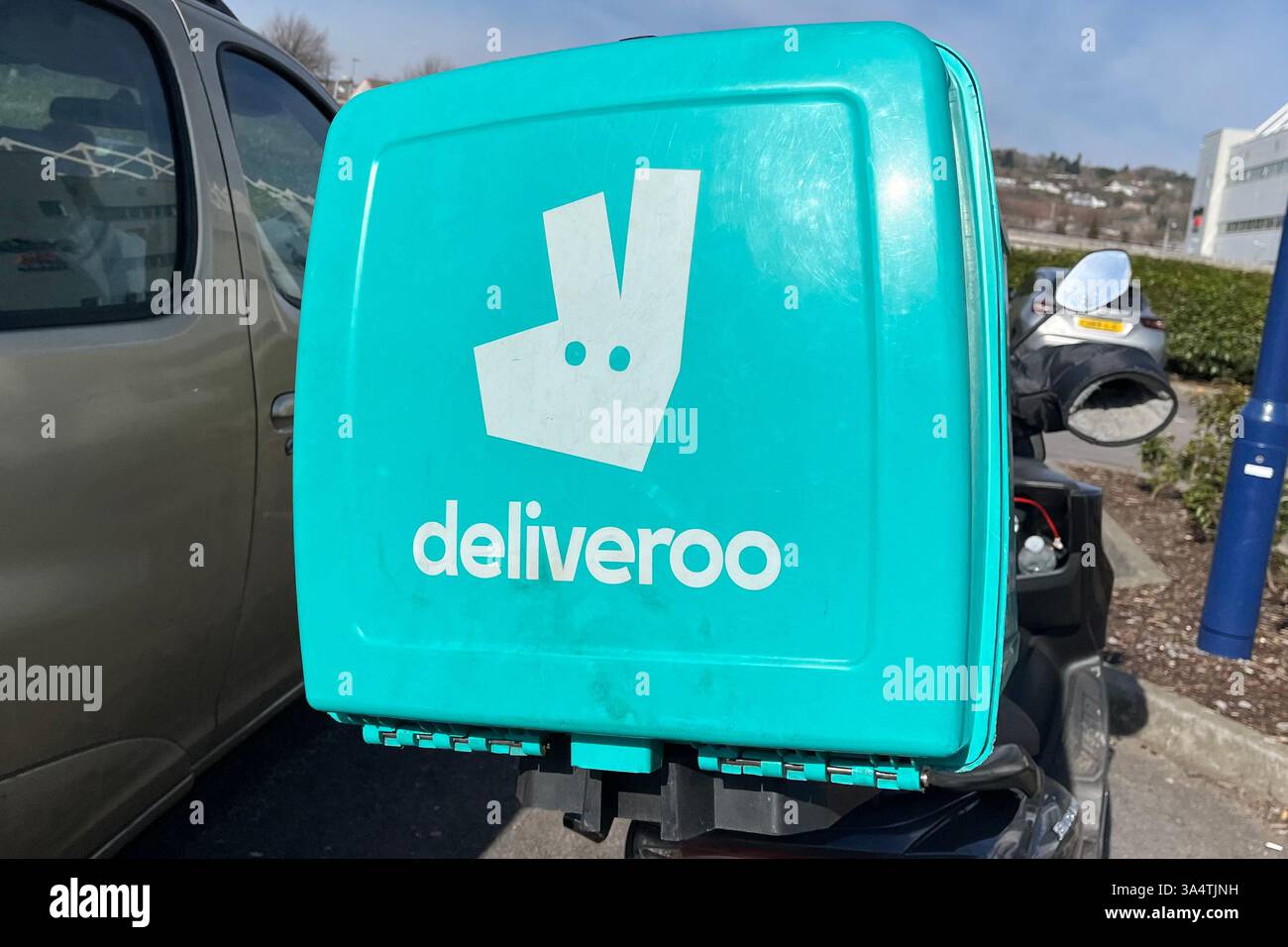 Deliveroo Food Box on the back of a motorbike. Swansea, Wales, United ...