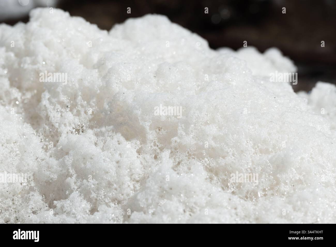 Macro photograph showing white foam textures with a bright appearance ...