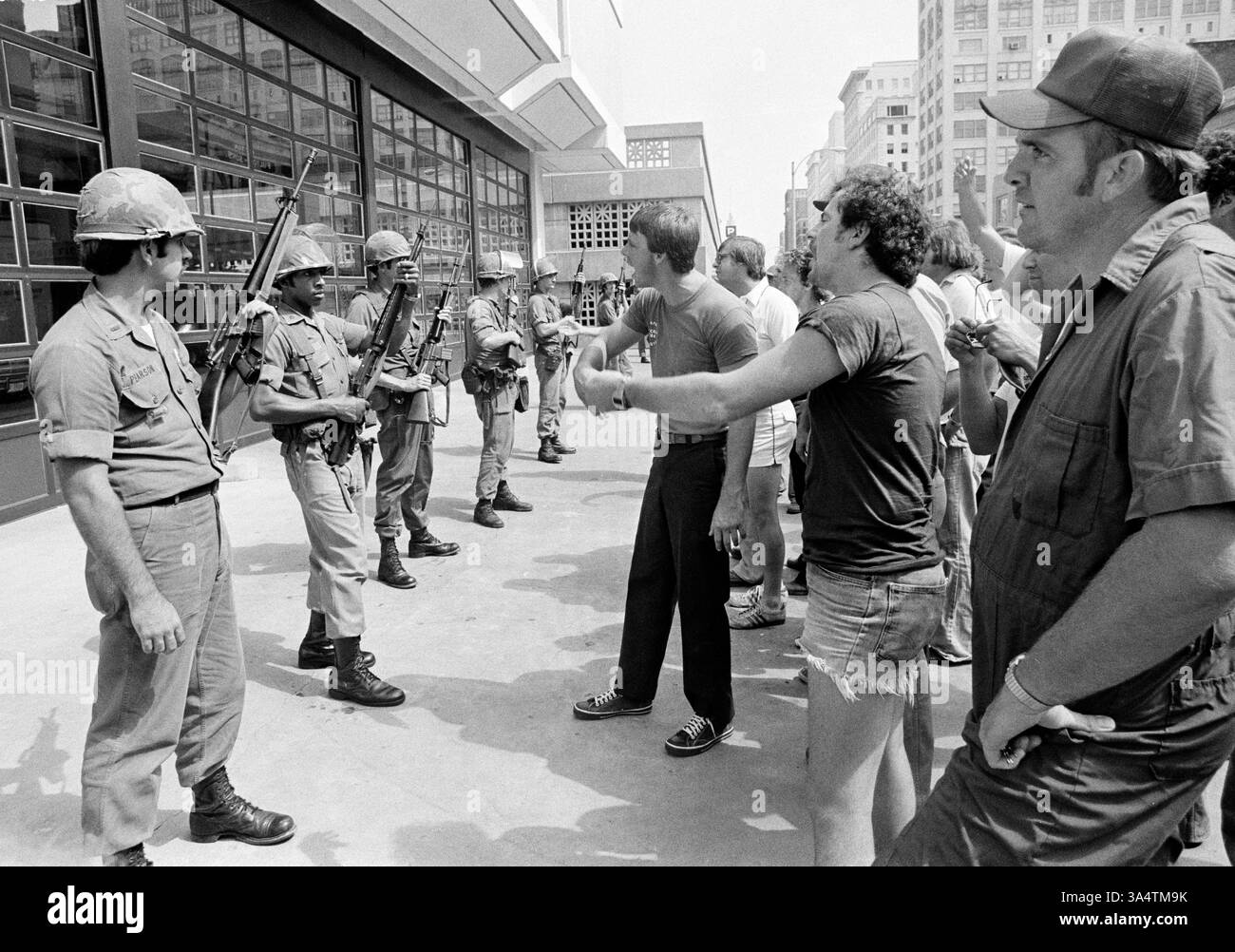 Striking firemen yell at working firefighters inside a downtown Memphis ...