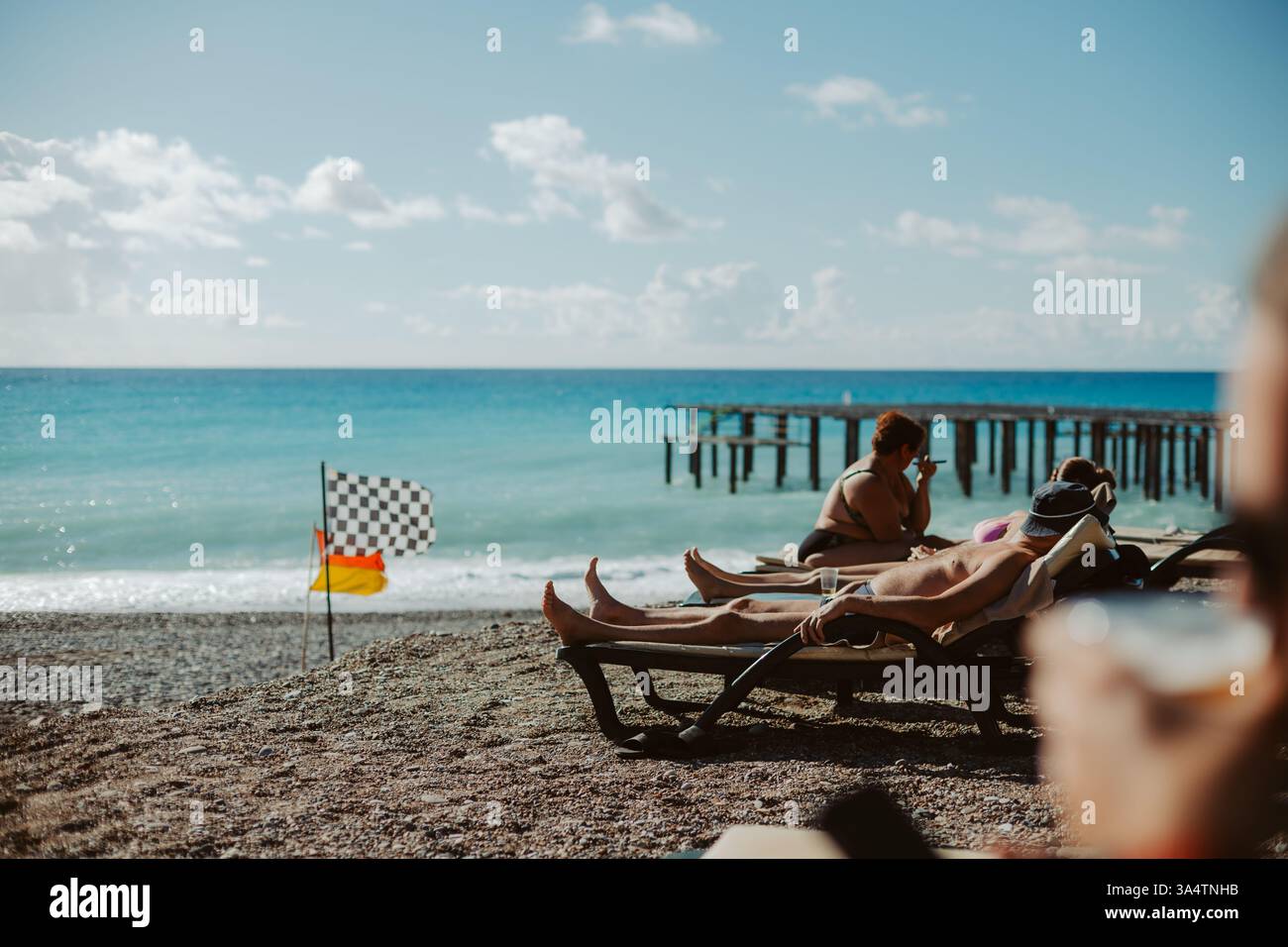 Sunbathing on the Beach – Strong UV Rays and Skin Health Risks Stock ...